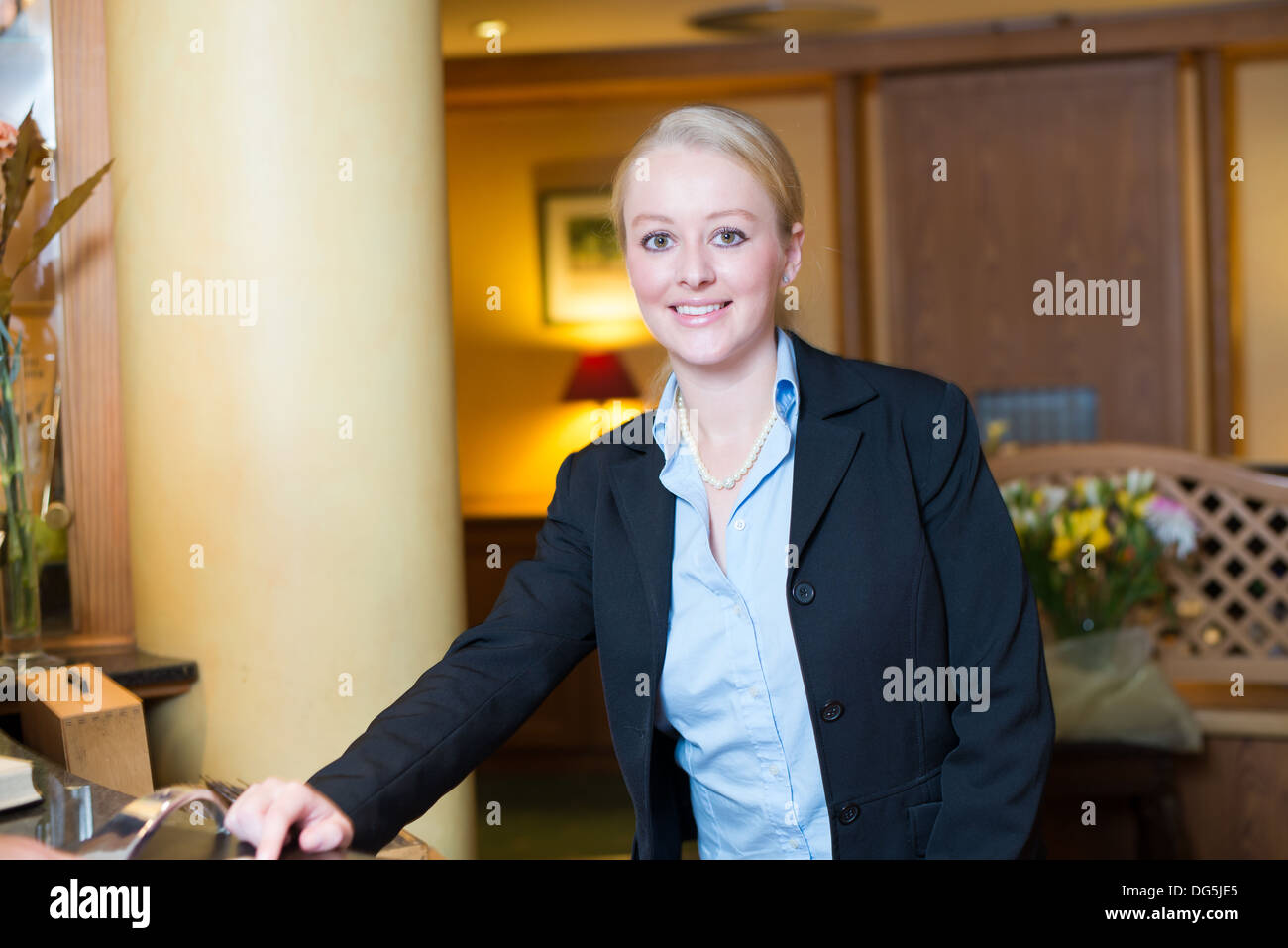 Friendly reception desk hi-res stock photography and images - Alamy