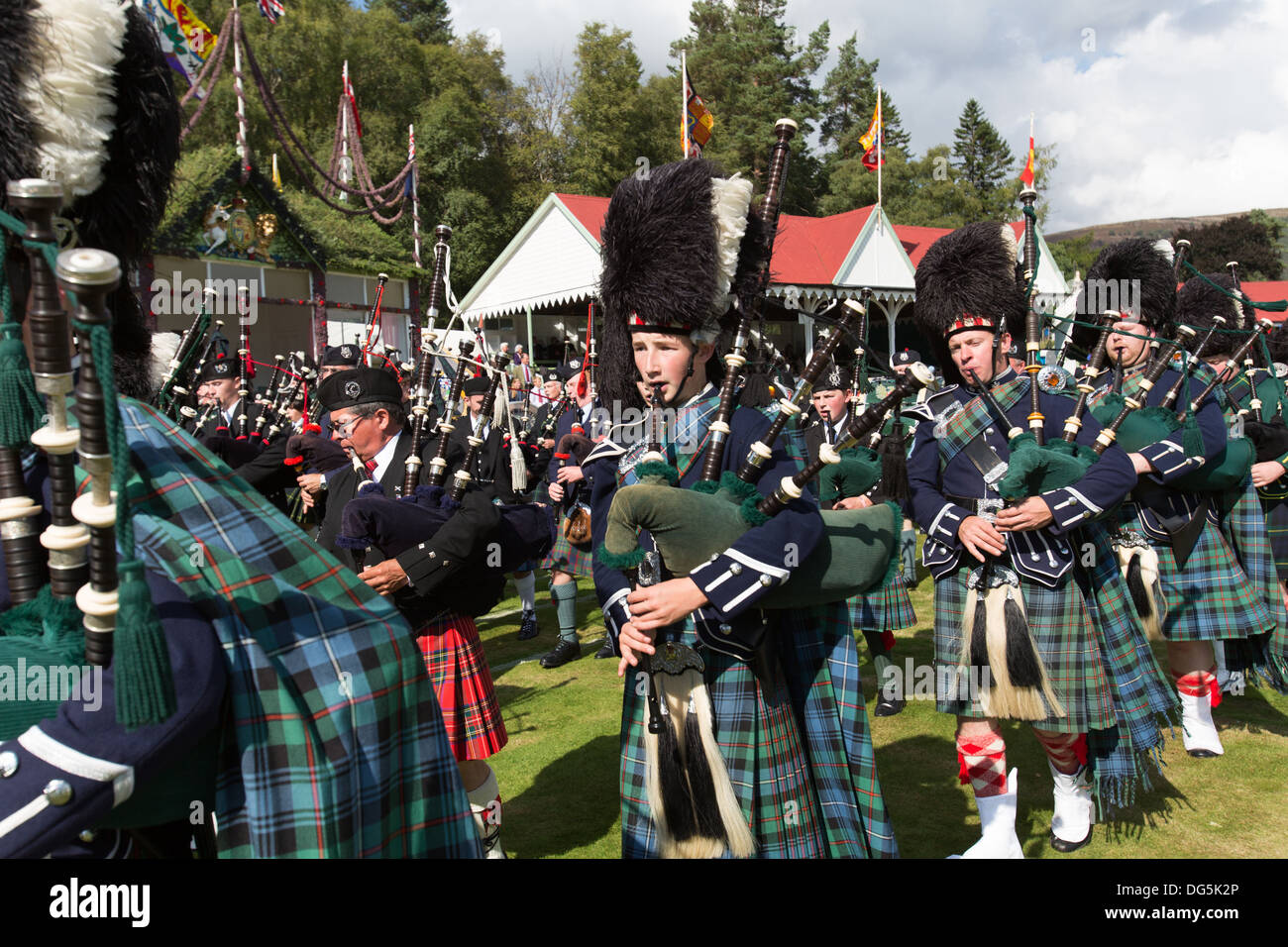 Village of Braemar, Scotland. The massed pipe bands marching at the ...