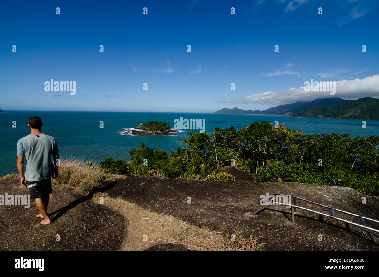 People at top belvedere enjoying the seascape view at Castelhanos Beach ...