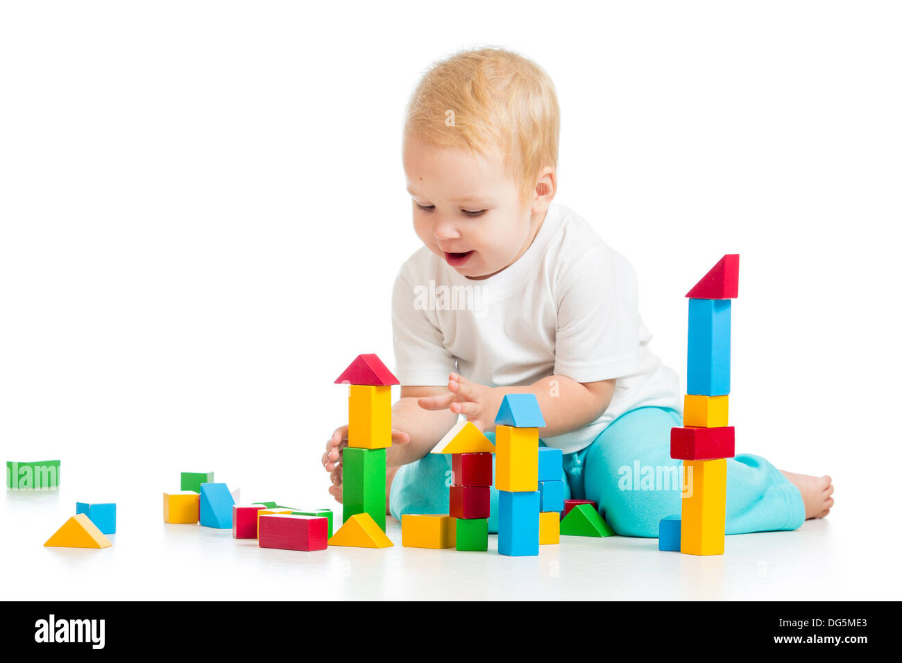 child playing with block toys over white background Stock Photo - Alamy