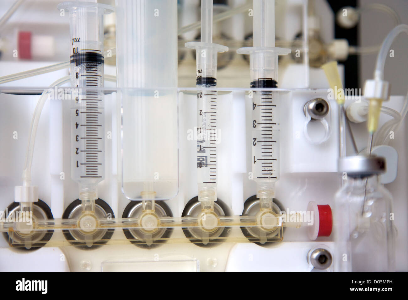 Laboratory glassware and electronic equipments ready for an experiment ...