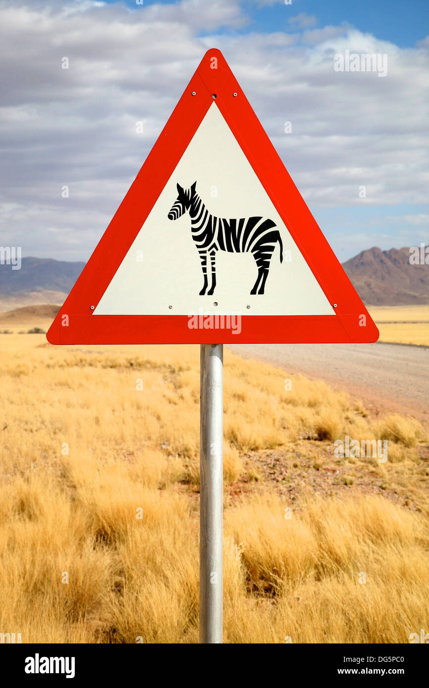 Danger Zebra Crossing Road Sign close to Country Road, Namibia, South ... Danger Zebra Crossing Road Sign close to Country Road, Namibia, South ...