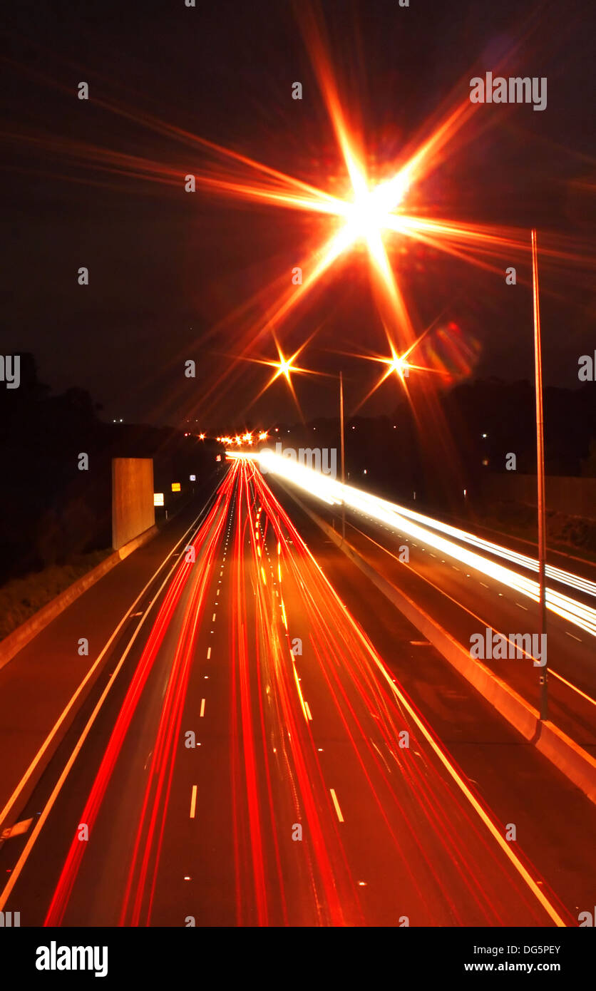 Long Exposure Of Traffic Light At Night Stock Photo - Alamy
