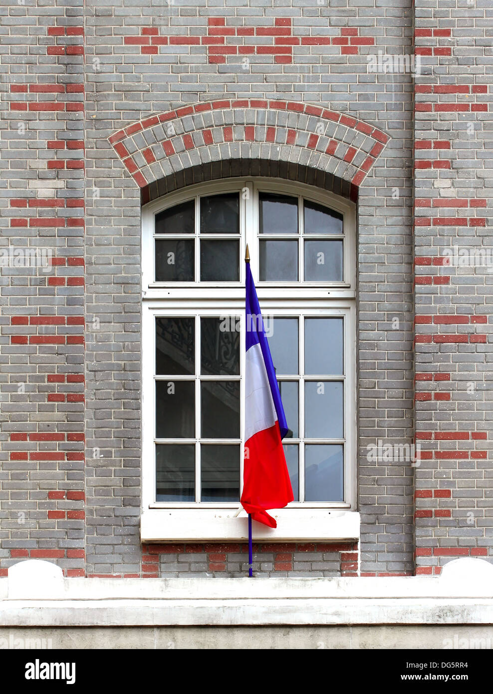 French Flag at Facade of Historic Building in Paris Stock Photo - Alamy