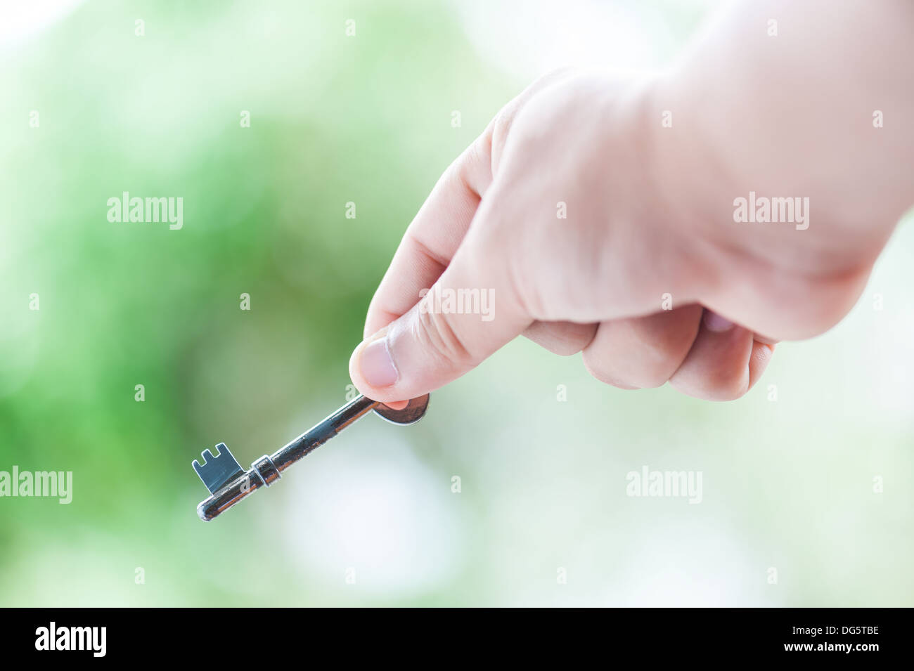 Old hand passing keys hi-res stock photography and images - Alamy