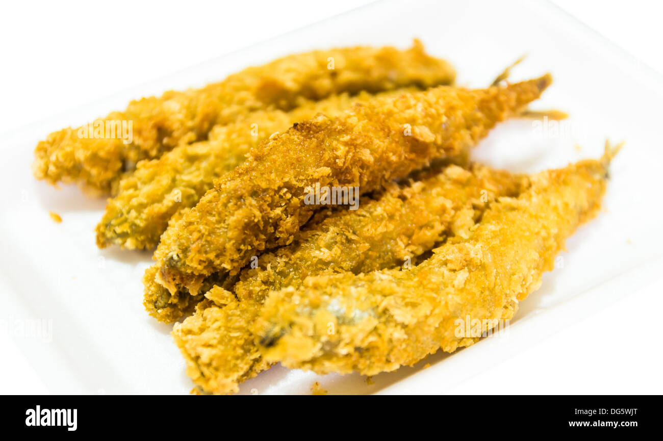 fried fish isolated on white background Stock Photo - Alamy