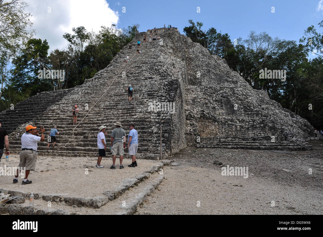 COBA,MEXICO - FEBRUARY 19: Group of tourists climb down the steep ...