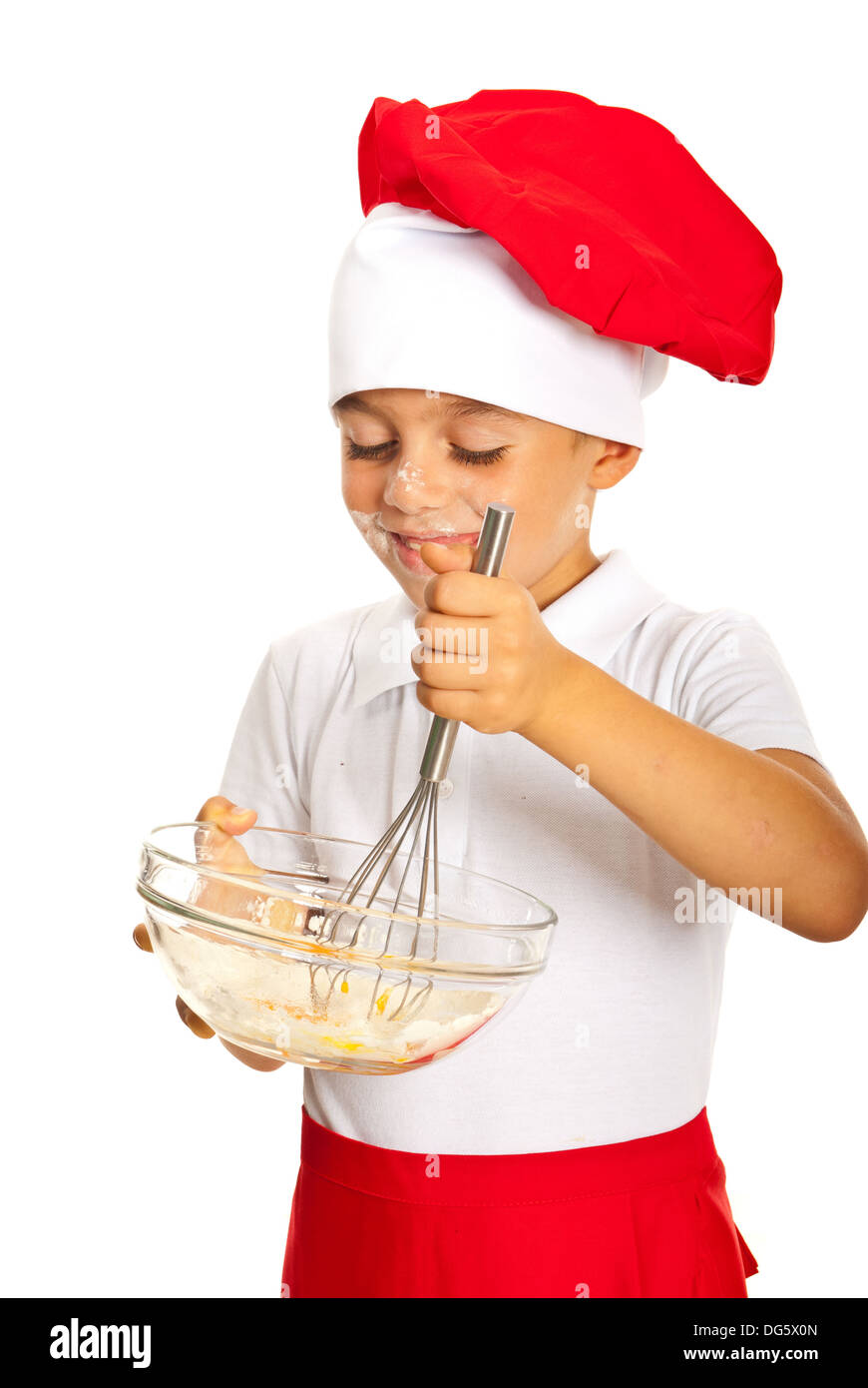 Happy chef boy mixing dough isolated on white background Stock Photo ...