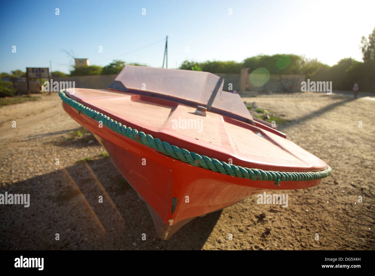 Small red boat in the harbour of Saint Louis with blue sky Stock Photo ...