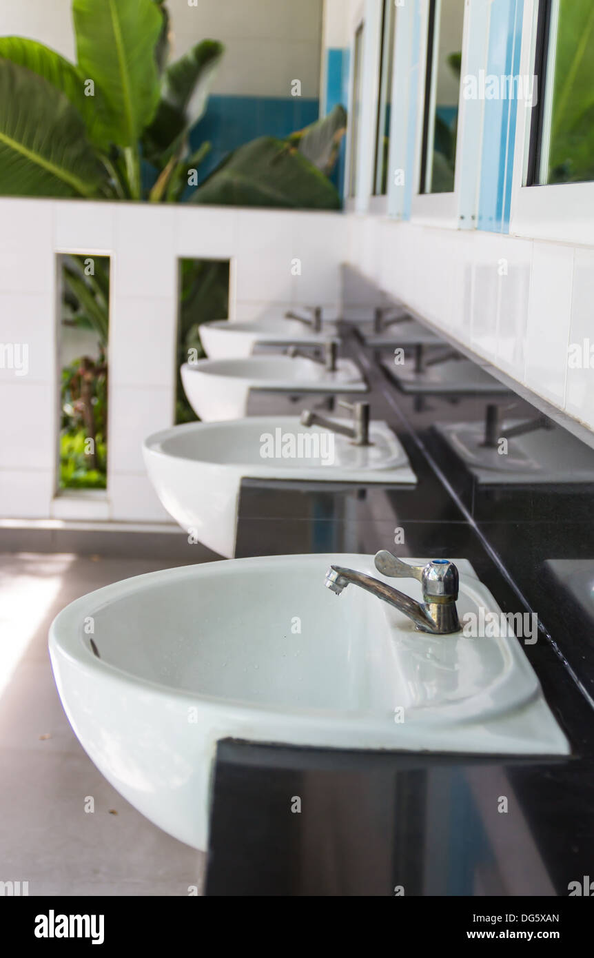 Modern style interior design of a washbasin at public toilets Stock ...