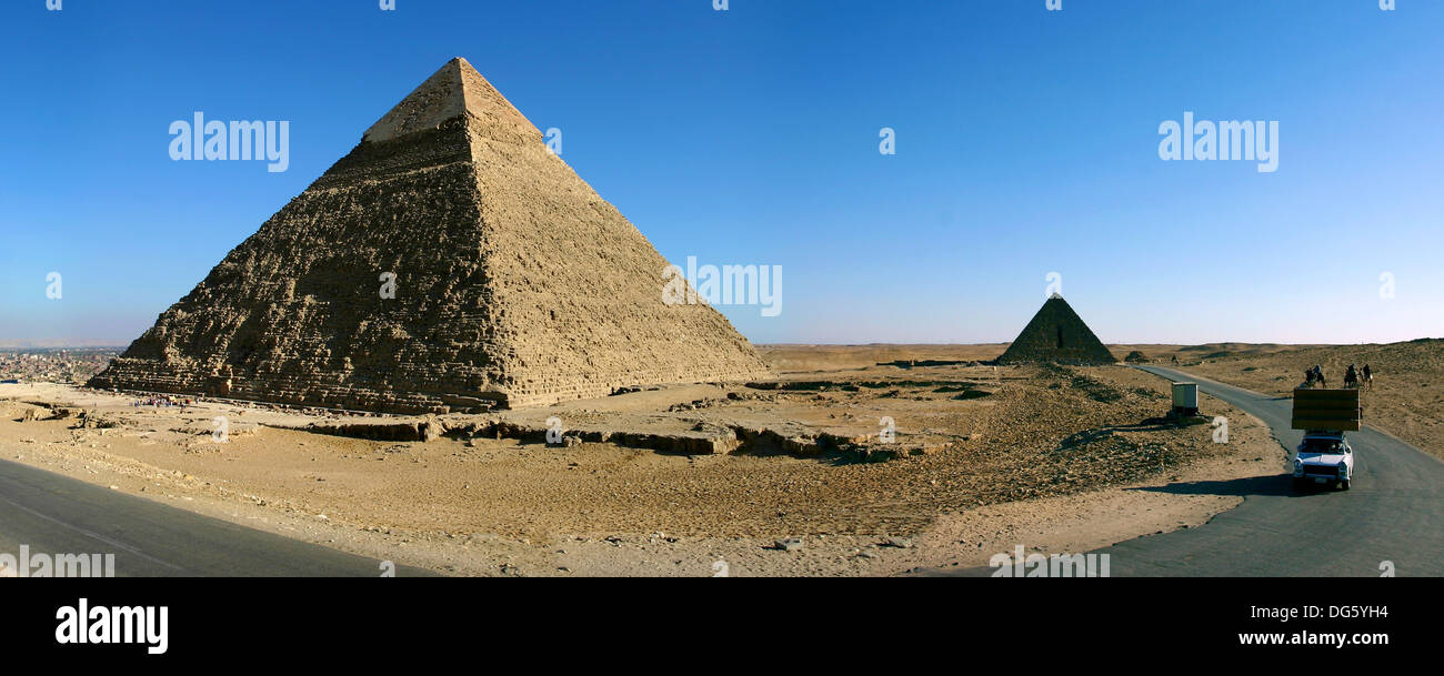 Panorama view of Giza pyramids with a clear blue sky, Egypt Stock Photo ...