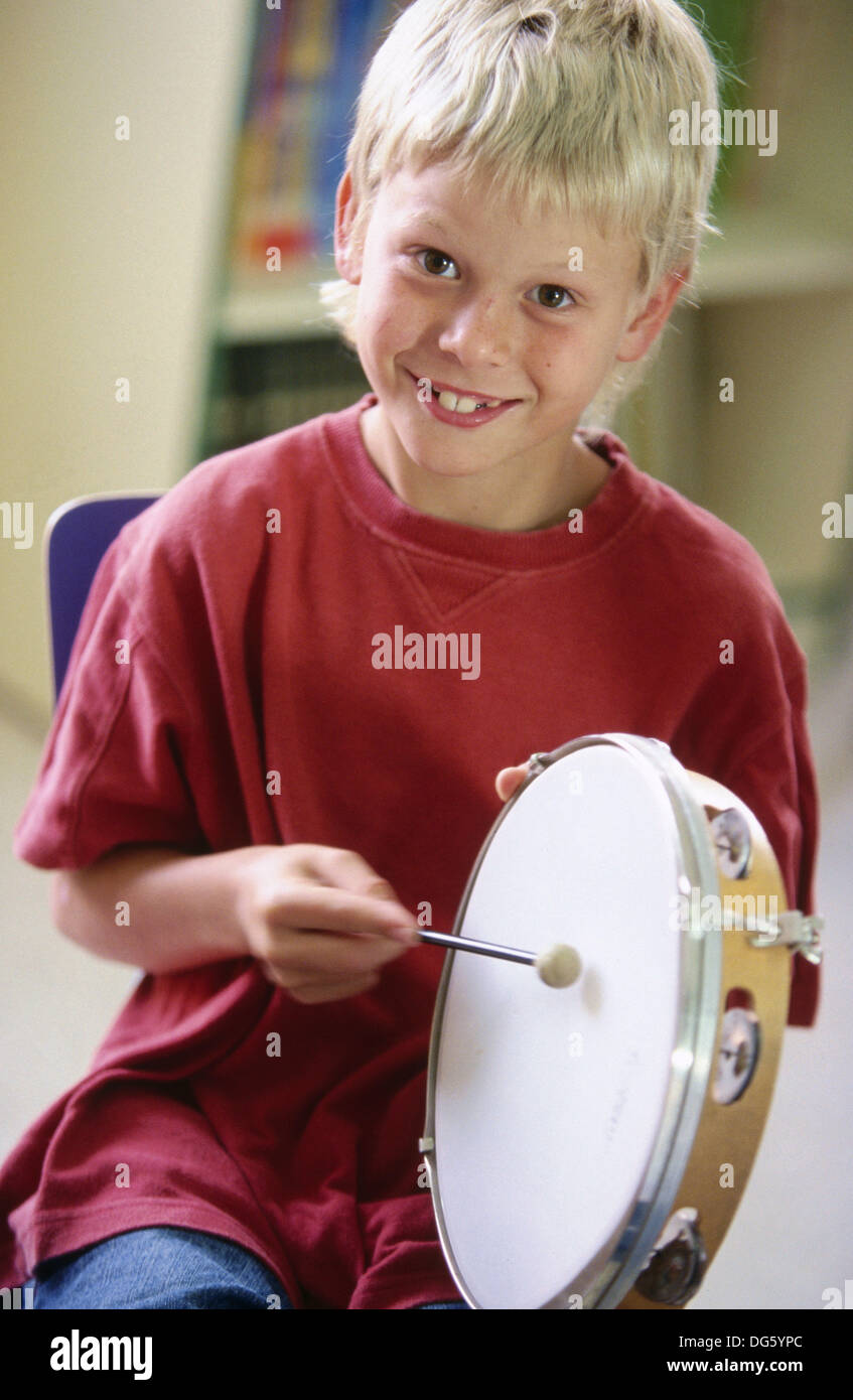 School children playing percussion instruments hi-res stock photography ...