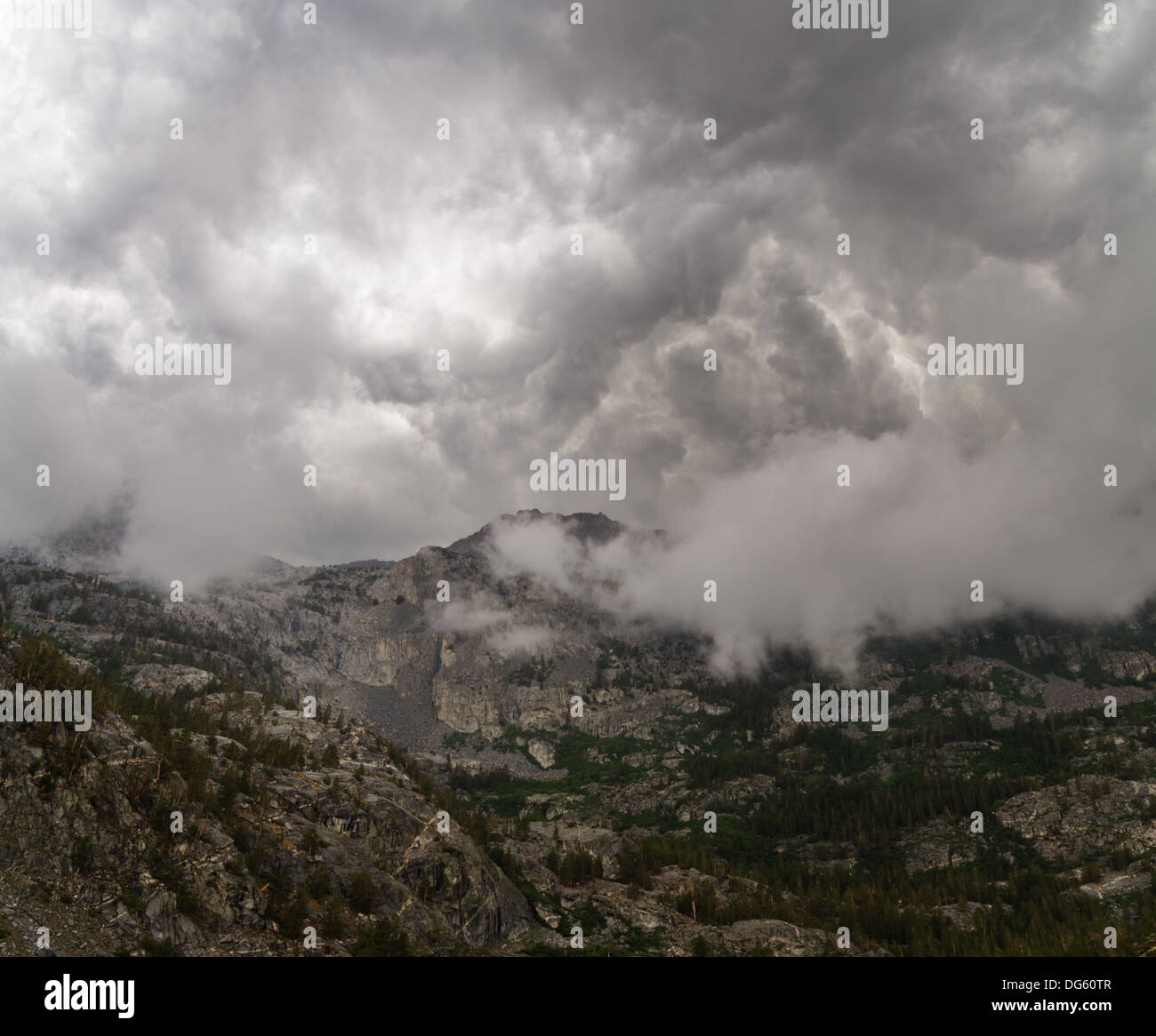 dramatic and threatening mountain clouds over Lake Sabrina basin near ...
