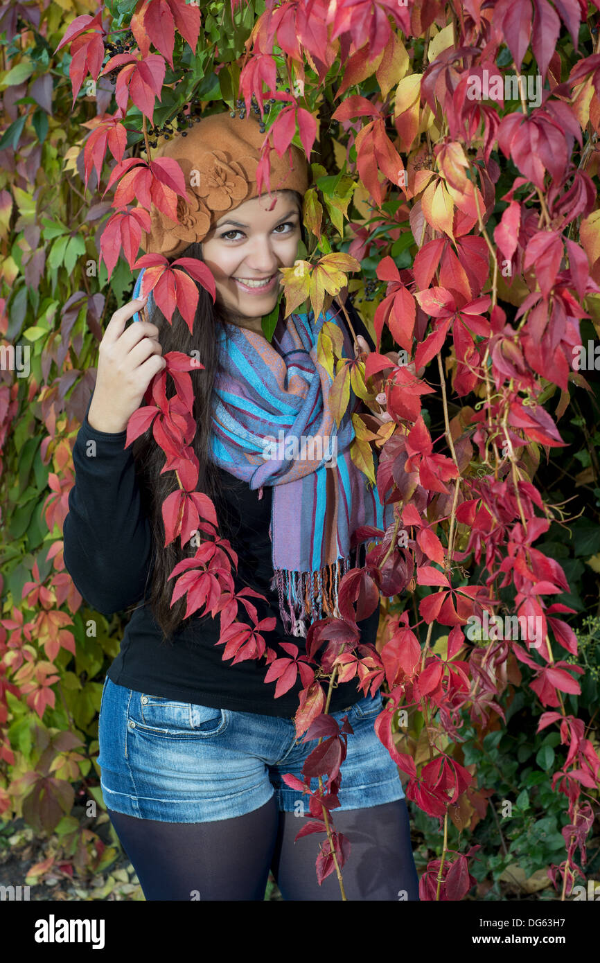 Happy caucasian girl with colorful autumn foliage Stock Photo - Alamy