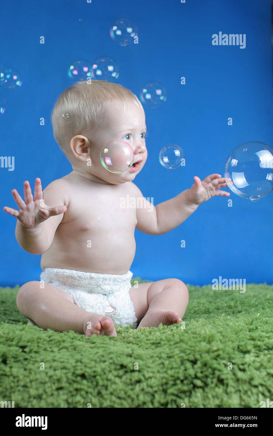 Baby girl wearing cloth nappy with bubbles Stock Photo - Alamy