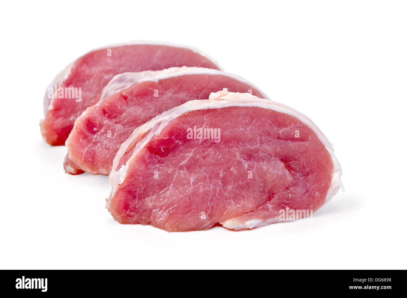 Three slices of pork meat isolated on white background Stock Photo - Alamy