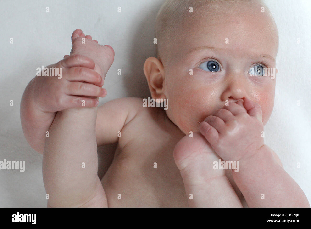 Child sucking foot hi-res stock photography and images - Alamy