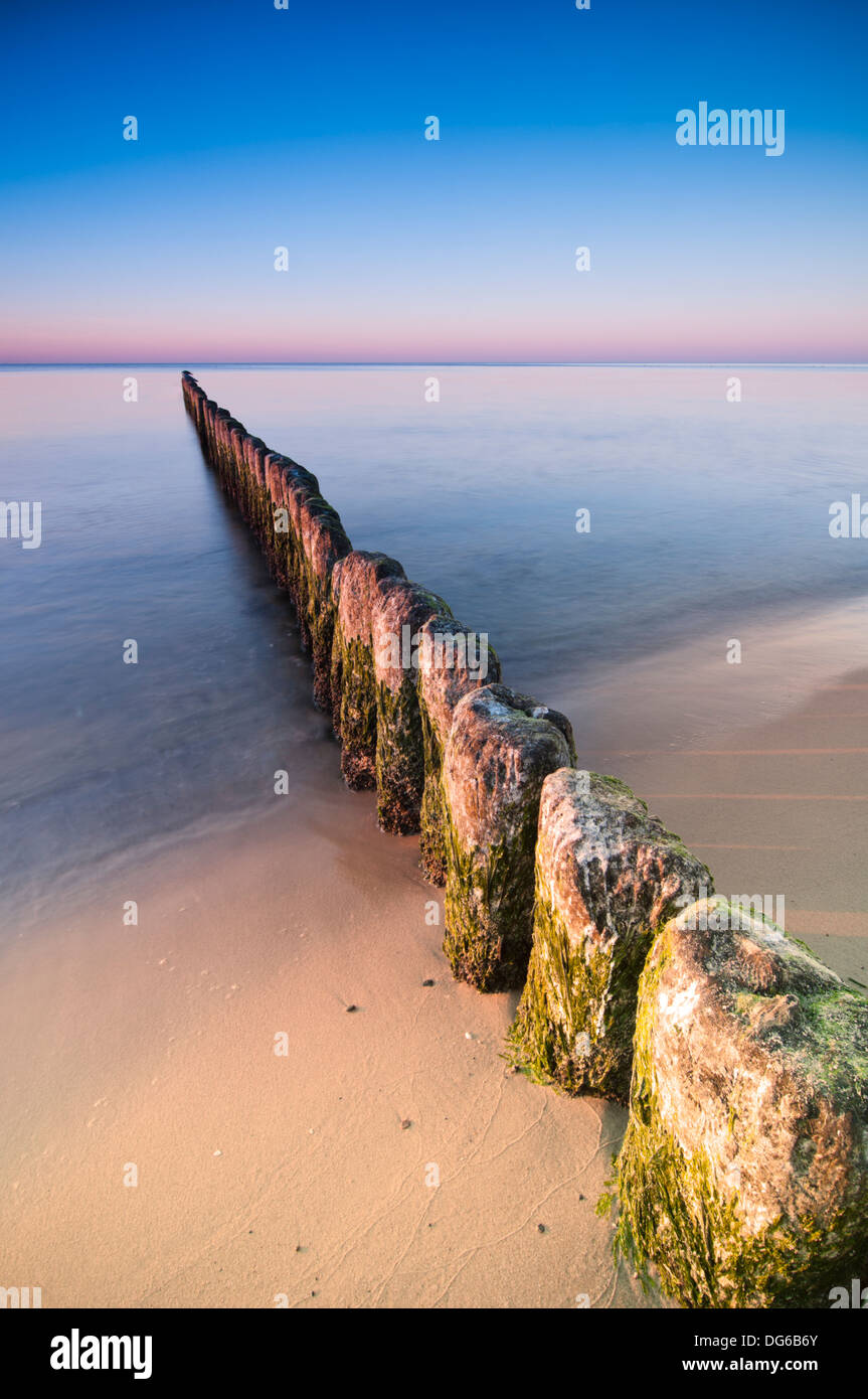 Long exposure shot over breakwater on Baltic Sea shoreline Stock Photo ...