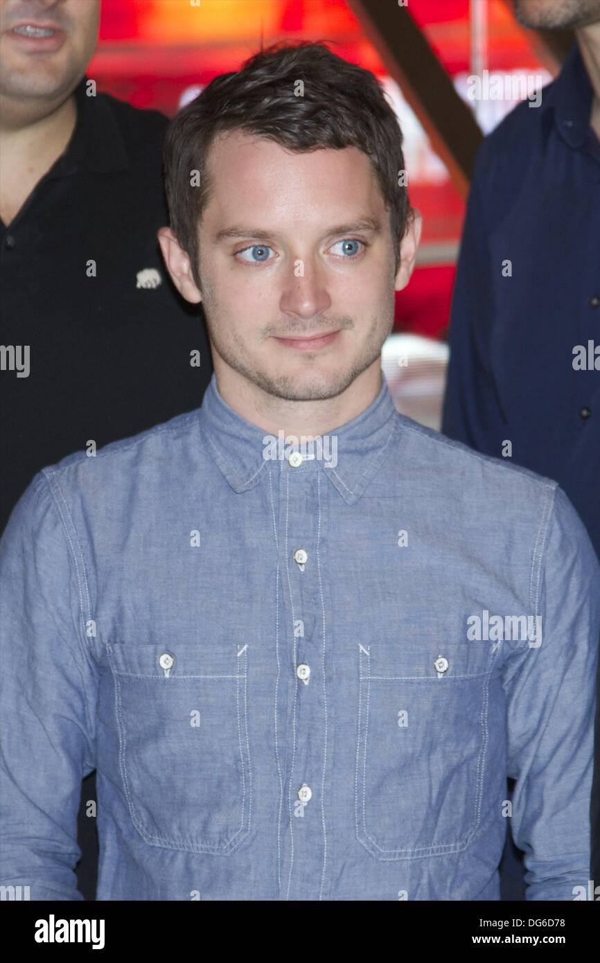 Madrid, Spain. 15th Oct, 2013. Elijah Wood, Director Eugenio Mira and ...