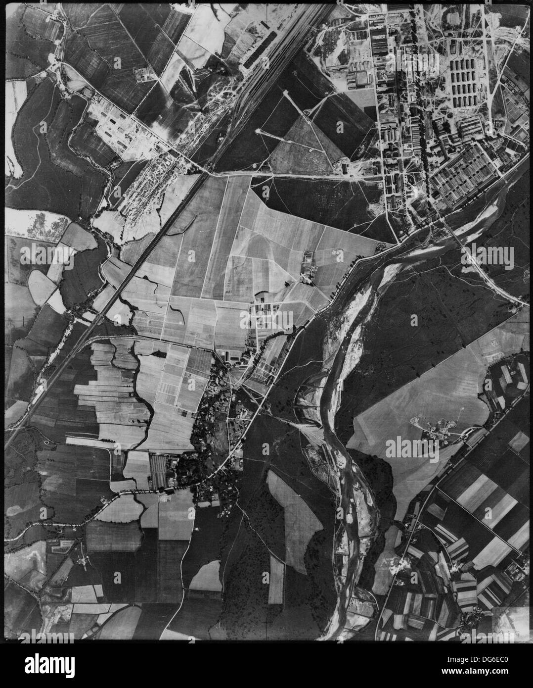 The photograph shows a historical view of Auschwitz Extermination Camp ...