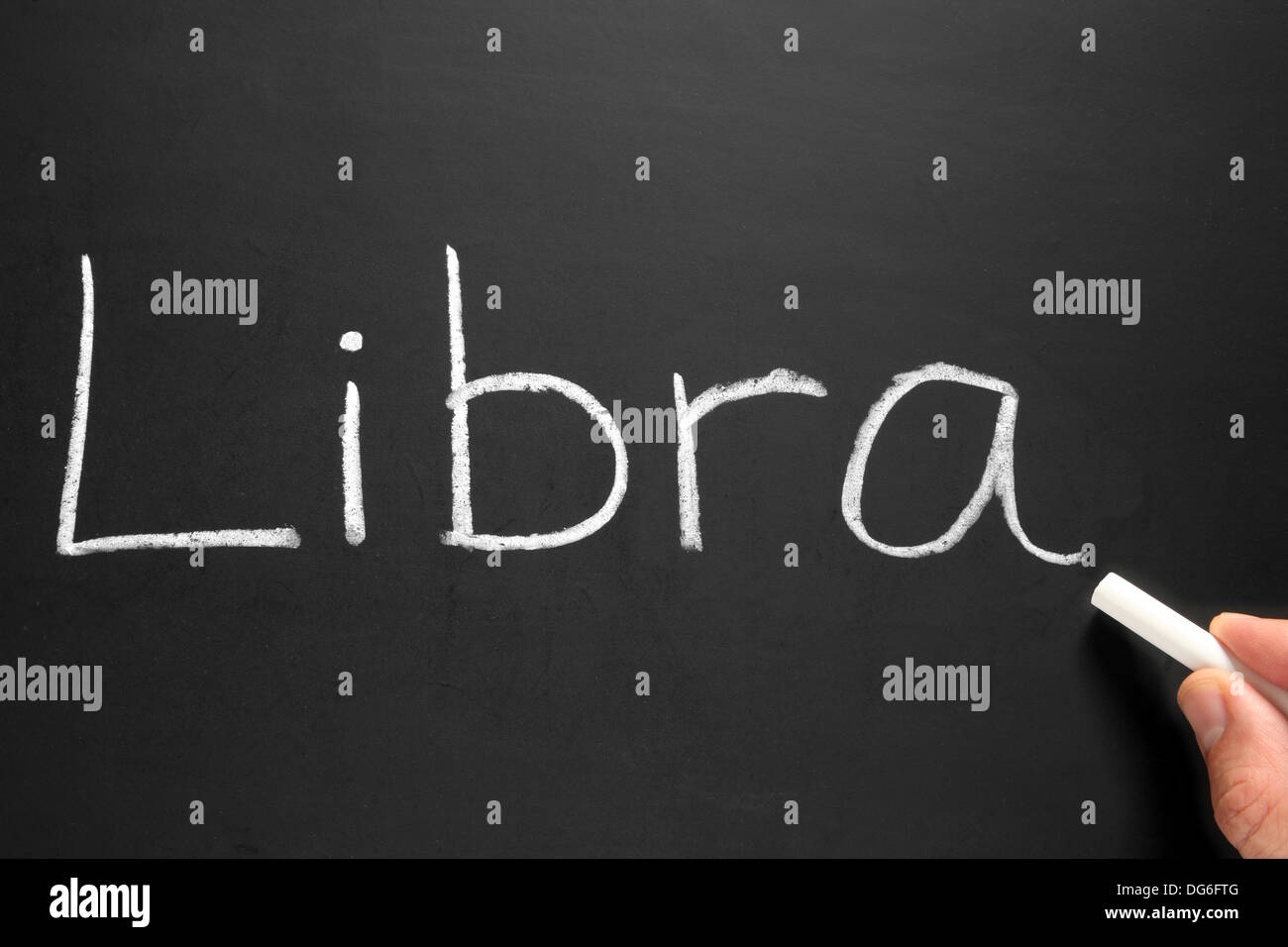 Libra star sign written on a blackboard Stock Photo - Alamy