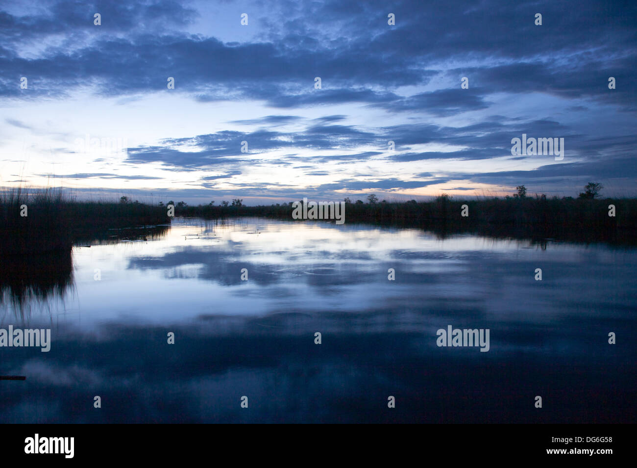 Okavango delta in botswana and sunset - Moremi Reserve Stock Photo - Alamy Okavango delta in botswana and sunset - Moremi Reserve Stock Photo - Alamy