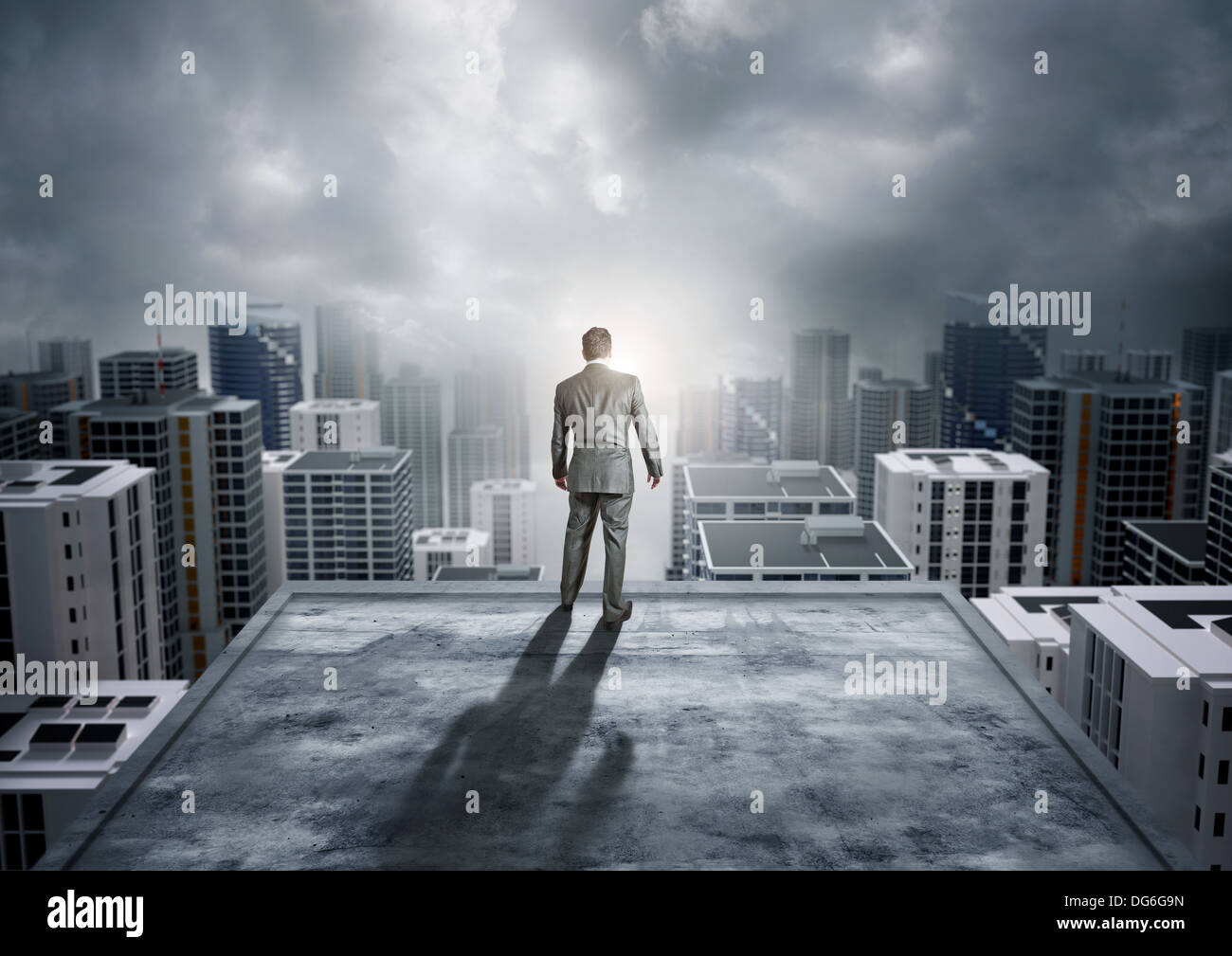 A businessman watching over the city Stock Photo - Alamy