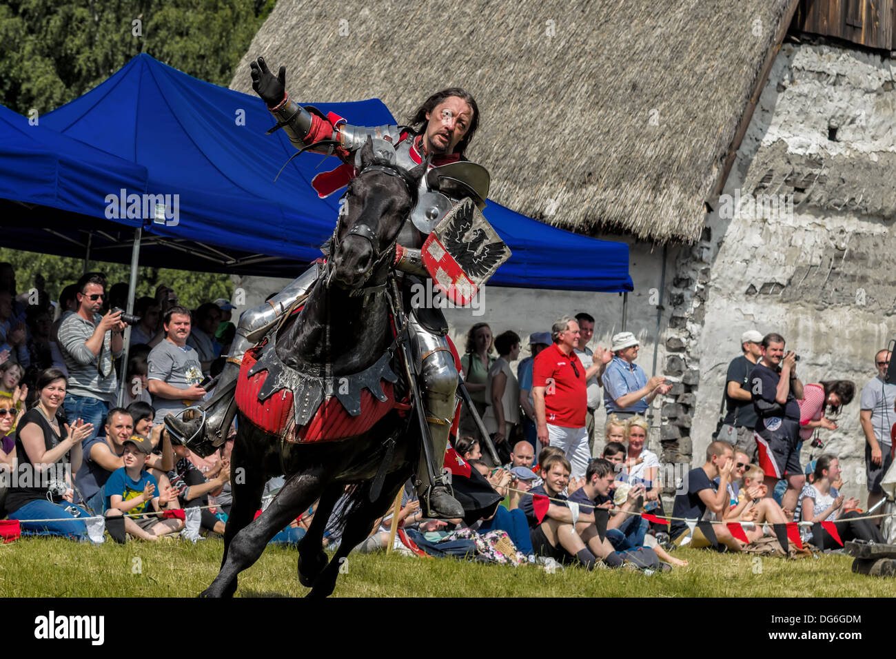 CHORZOW,POLAND, JUNE 9: Medieval knight on horseback during a IV ...