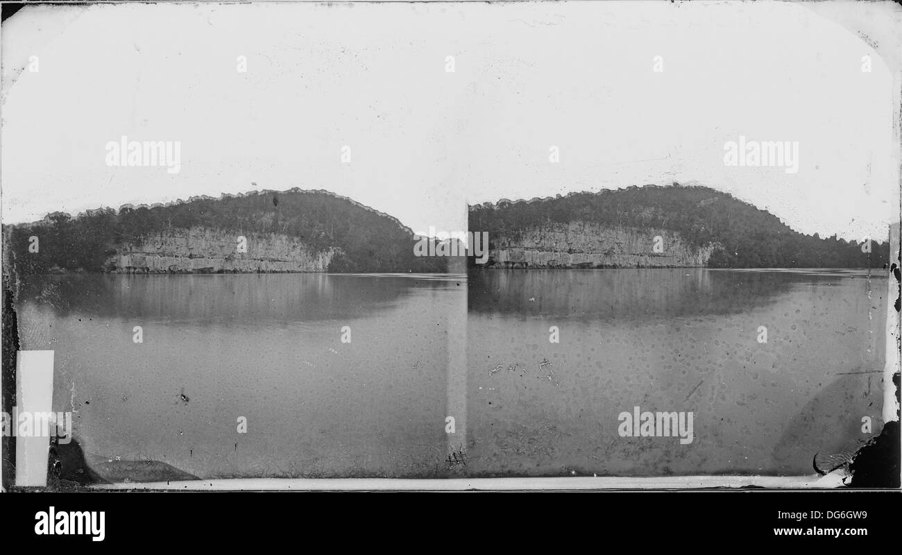 A bluff on a river is depicted in this image, showcasing the natural ...