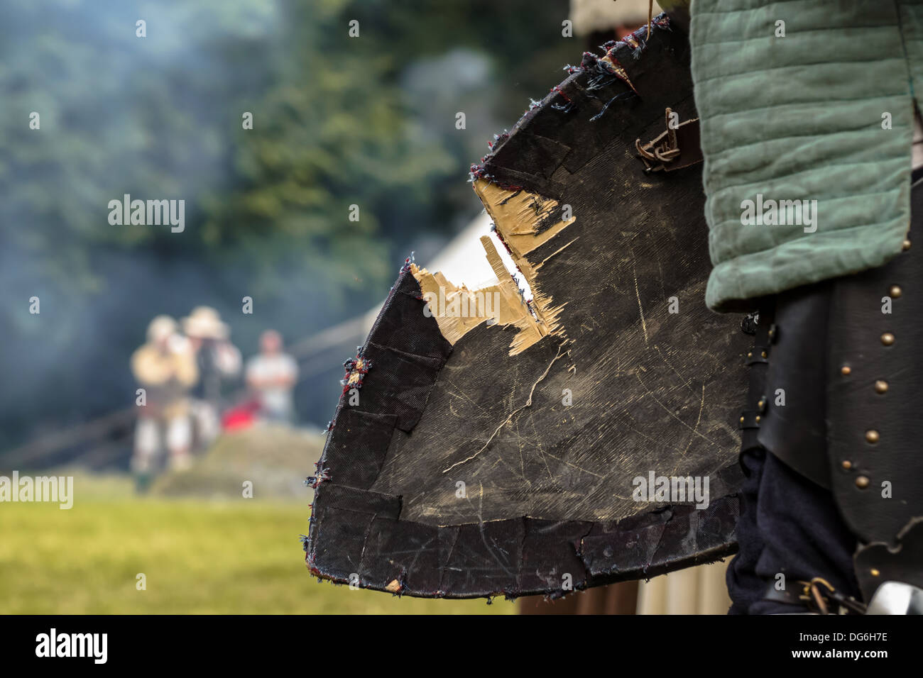 Damaged shield of medieval knight Stock Photo - Alamy
