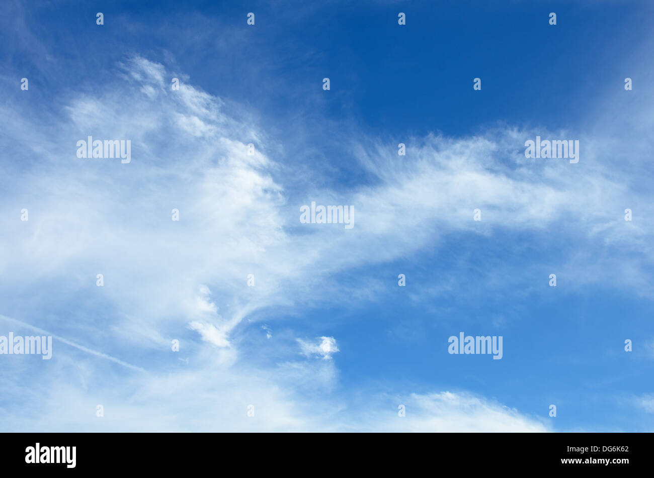 Blue sky with white cirrus and stratus clouds Stock Photo - Alamy