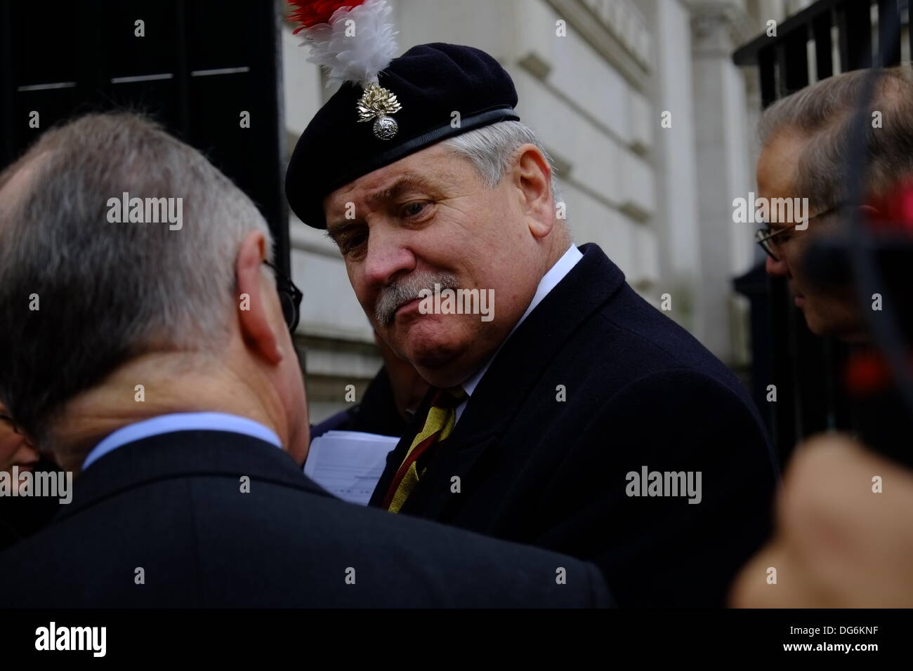 London, UK. 15th October 2013. Colonel Ian Brazier at the gates of ...