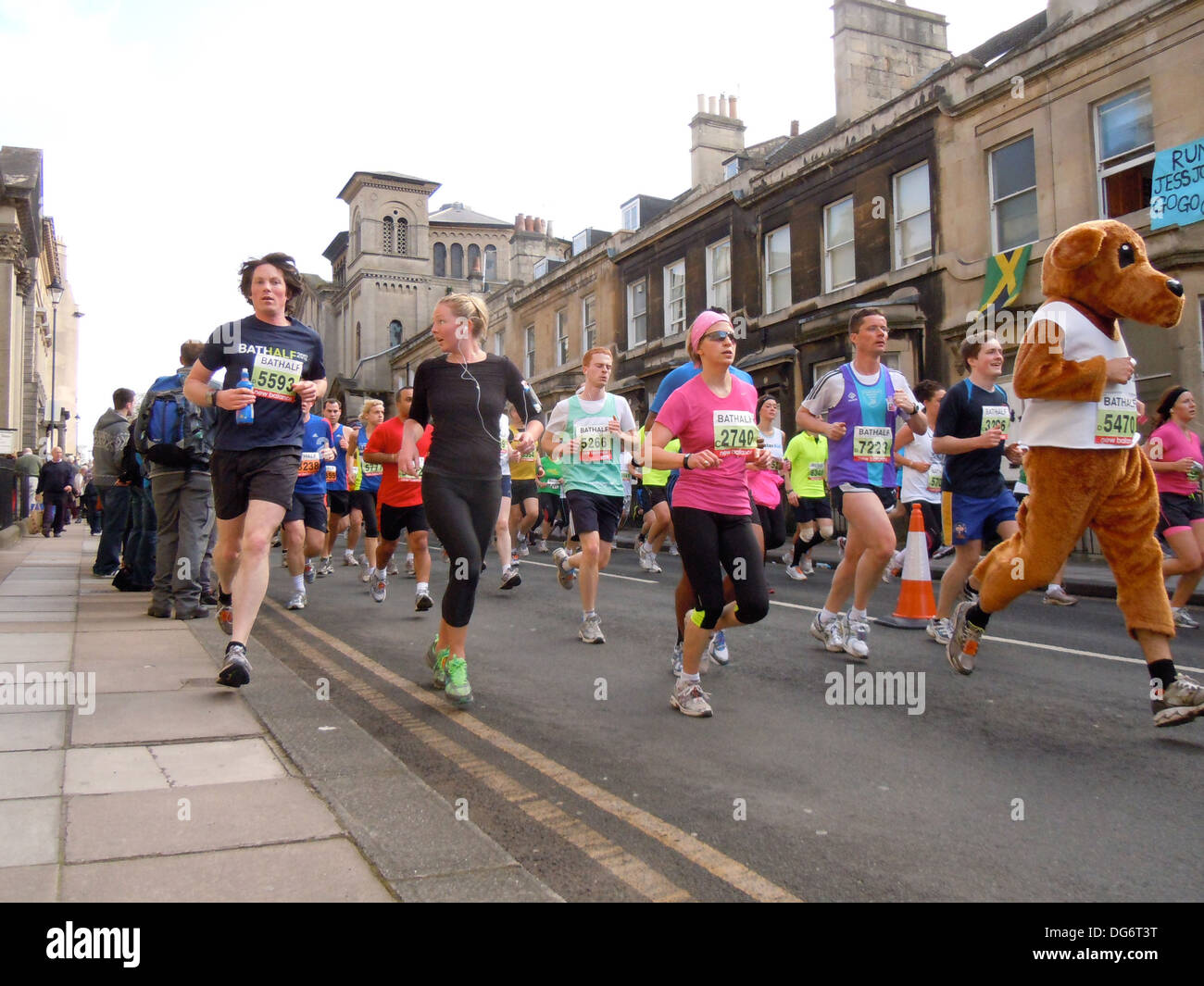 People watching and taking part in marathon Stock Photo - Alamy