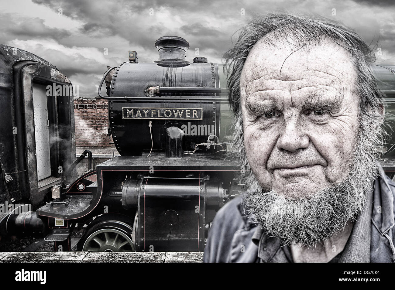 Mayflower steam engine with engineer stood in front Stock Photo - Alamy