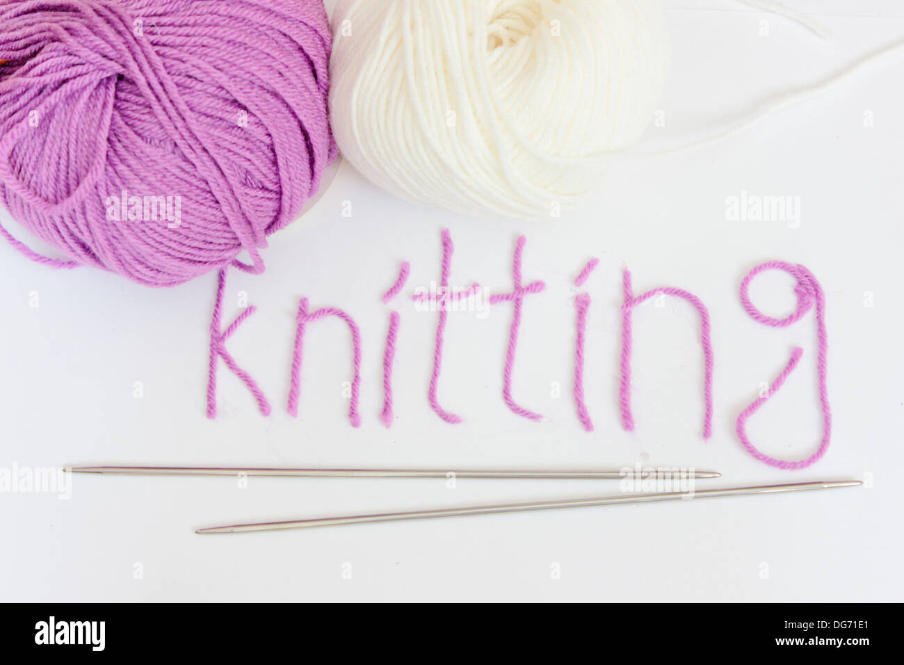 Ball of yarn with knitting needles hi-res stock photography and images ...