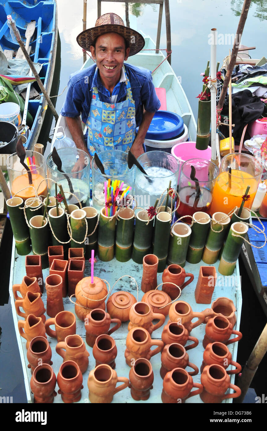 A drink boat vendor at the Hatyai's Klong Hae Floating Market in ...