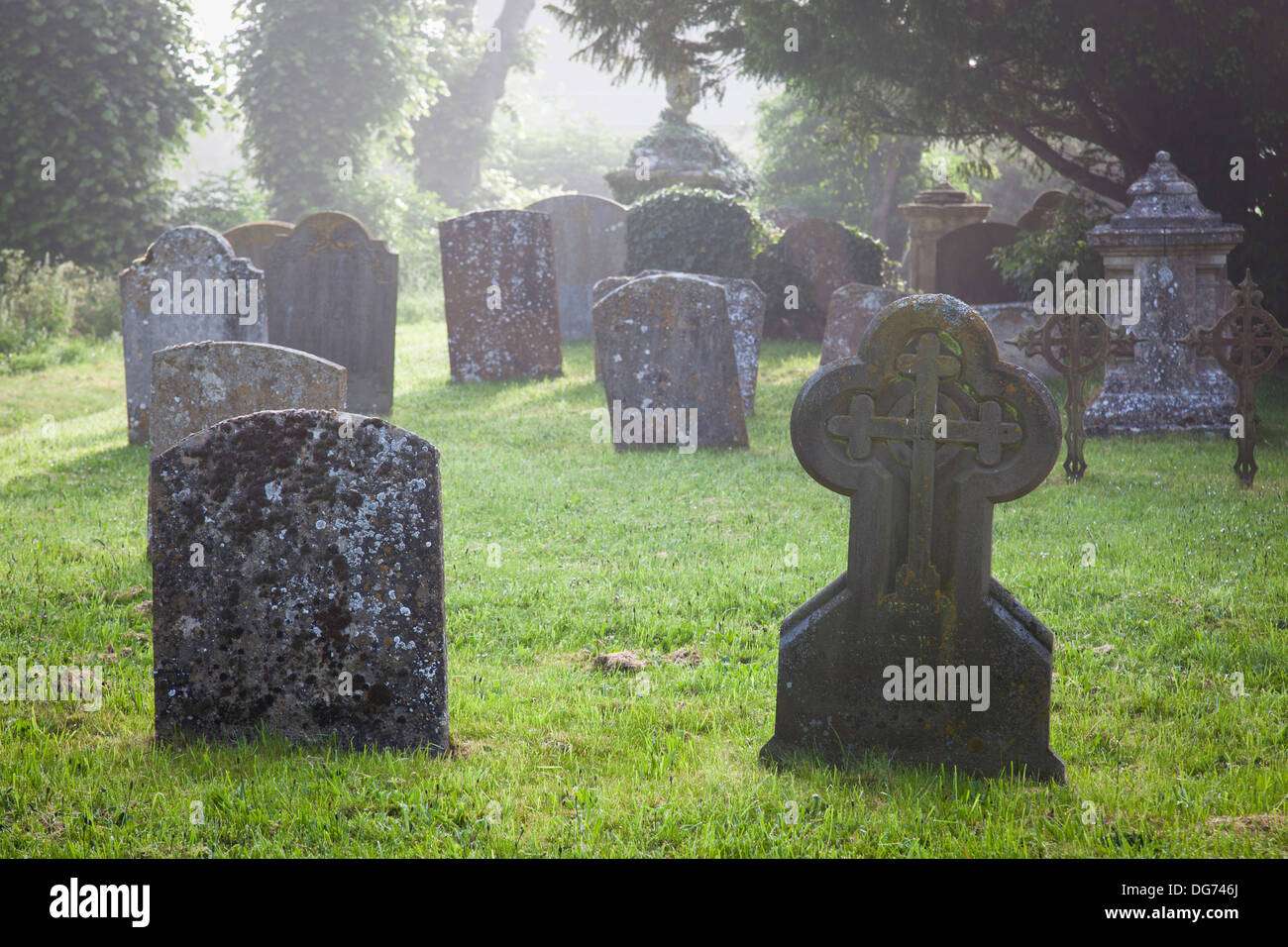 Churchyard of St Mary the Virgin in Bampton, Oxfordshire with old ...