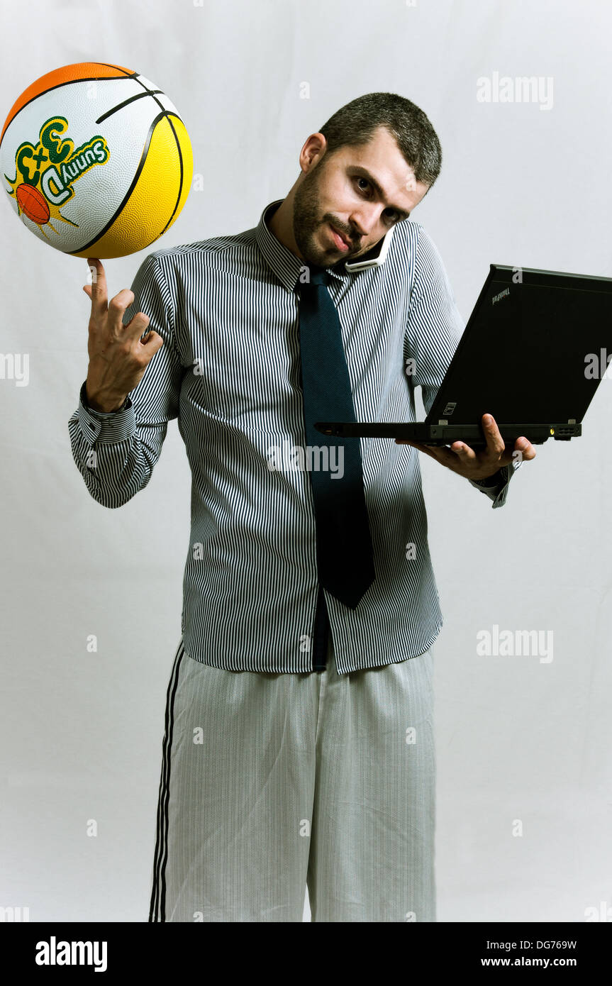 A young model plays basketball in a studio session Stock Photo - Alamy