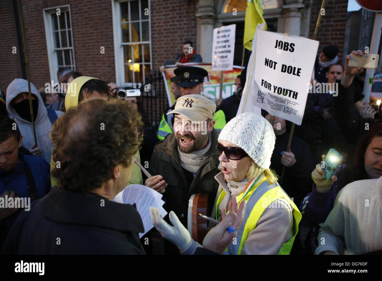 Dublin, Ireland. 15th October 2013. Protesters argue with Joe Little (L ...