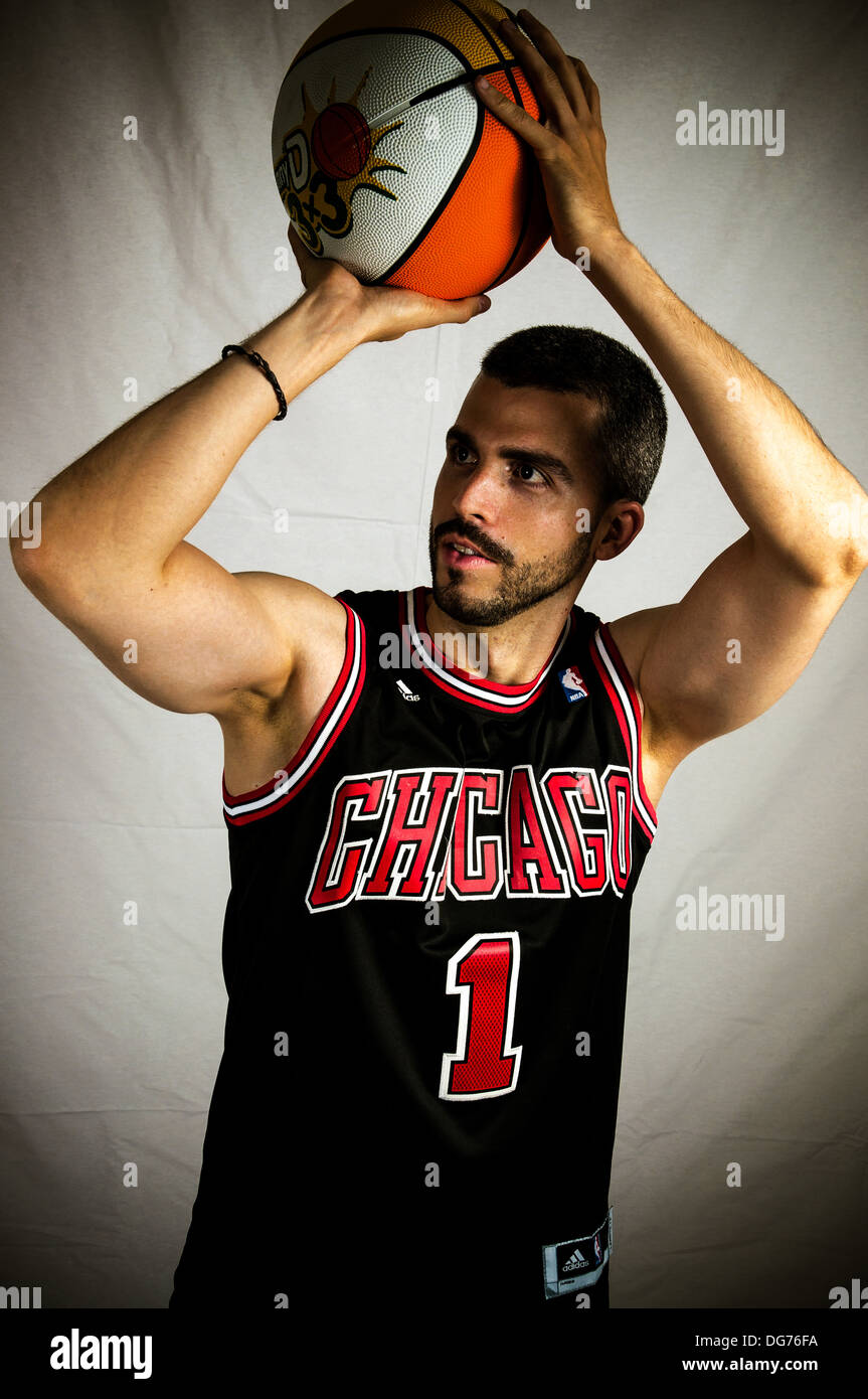 A young model plays basketball in a studio session Stock Photo - Alamy