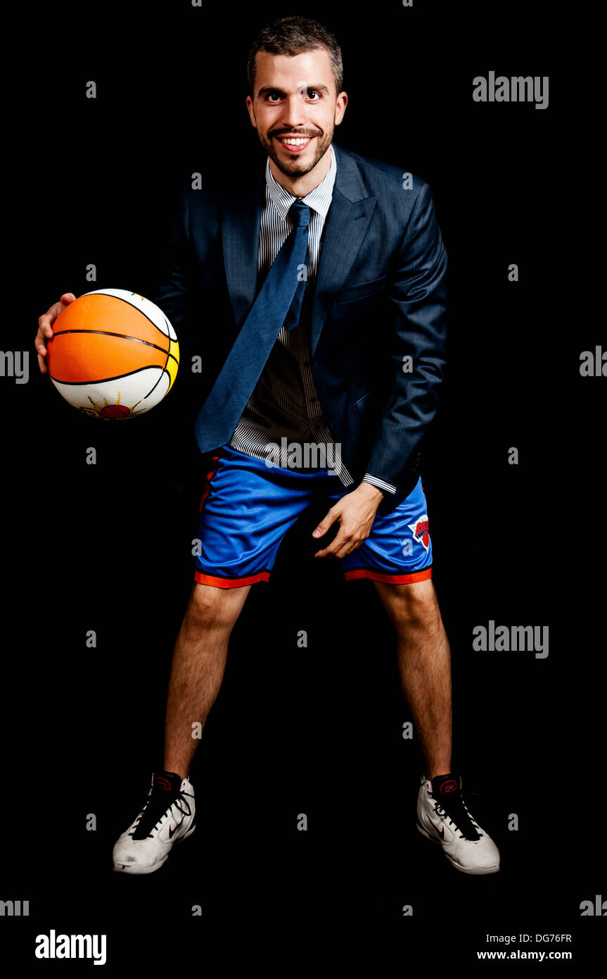 Man in a grey suit and blue shirt hi-res stock photography and images ...