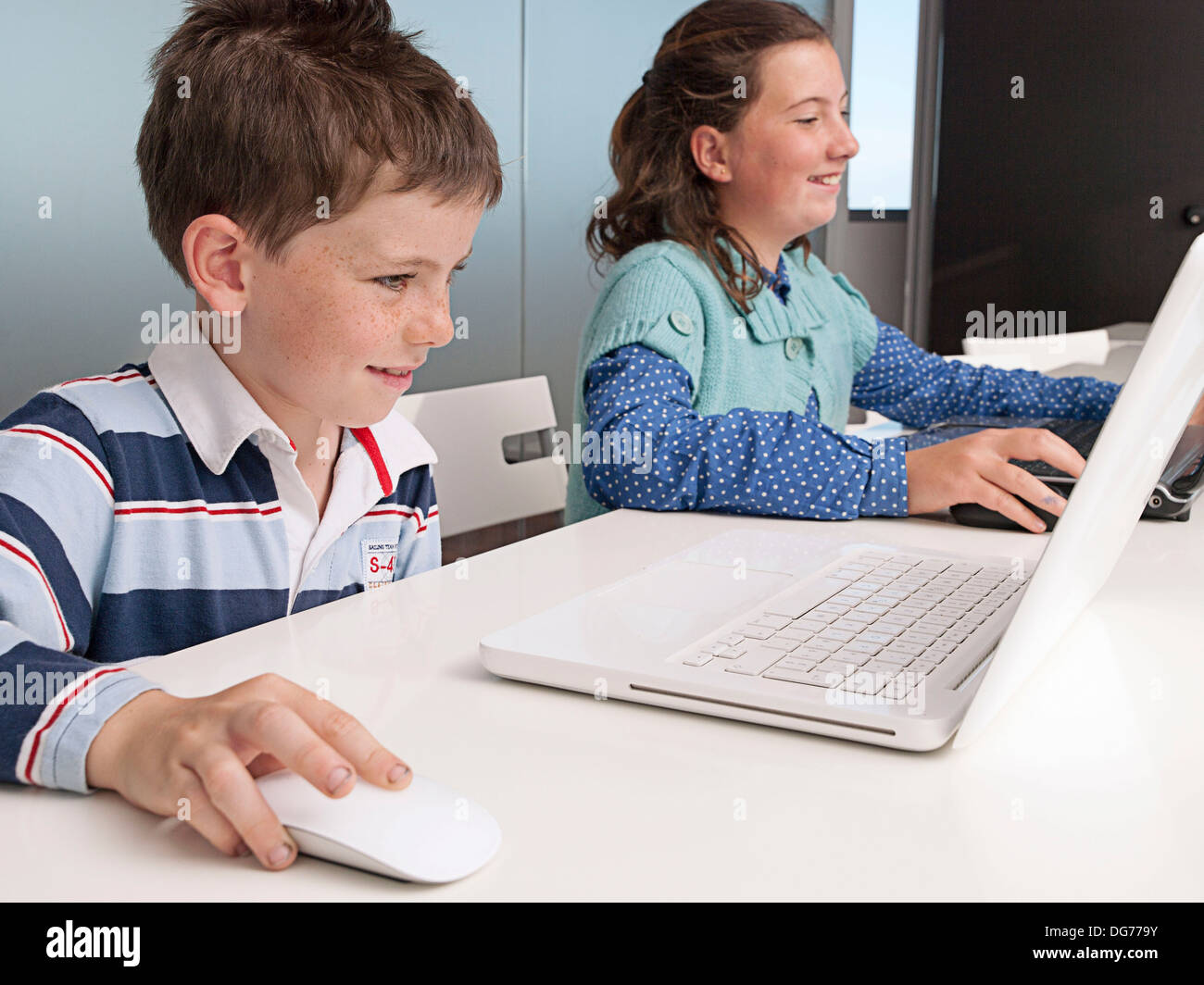 Kid helping another kid hi-res stock photography and images - Alamy