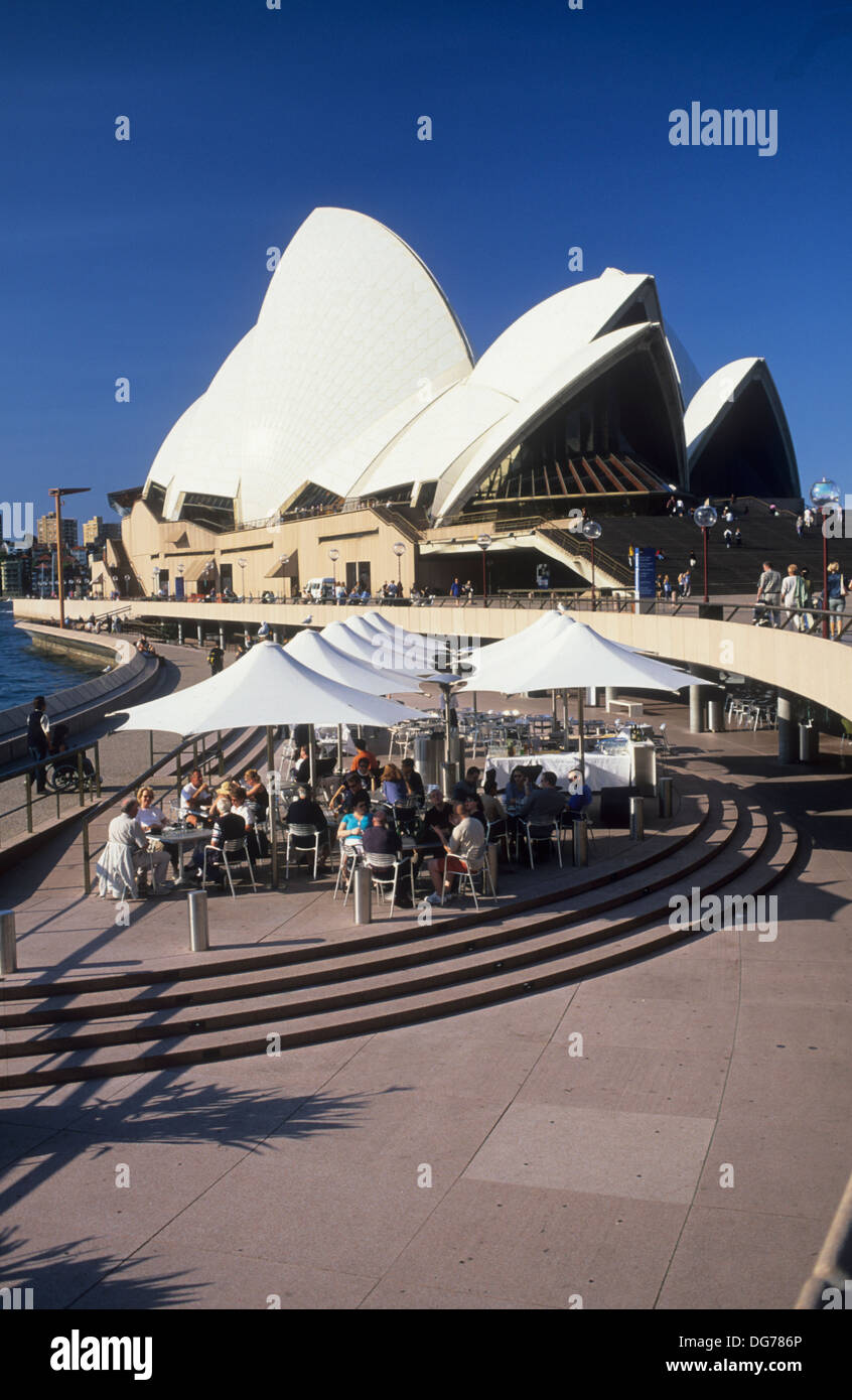 Australia, Sydney, the opera house and street cafe along East Quay ...