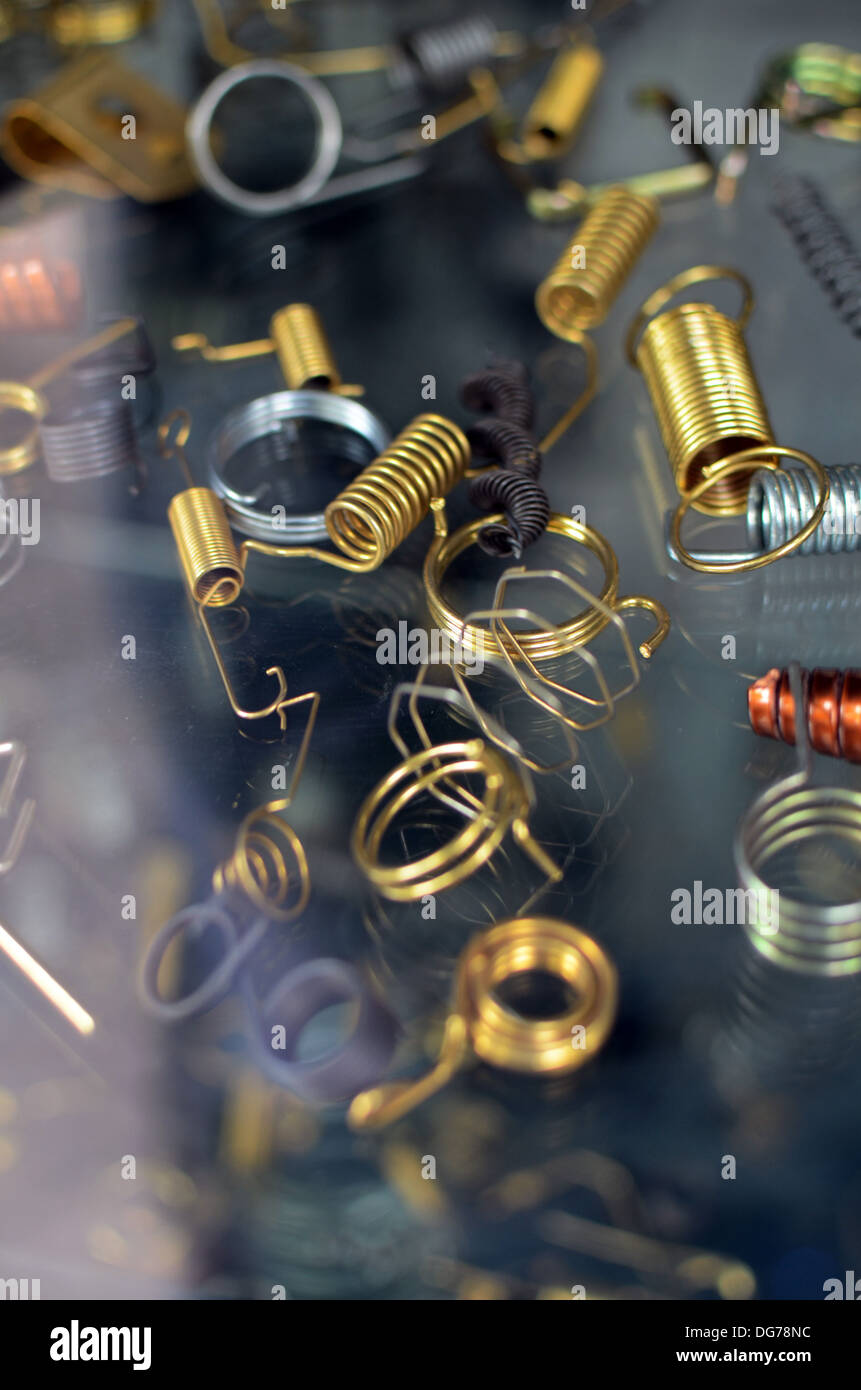 Metal replacement parts in store window Stock Photo - Alamy