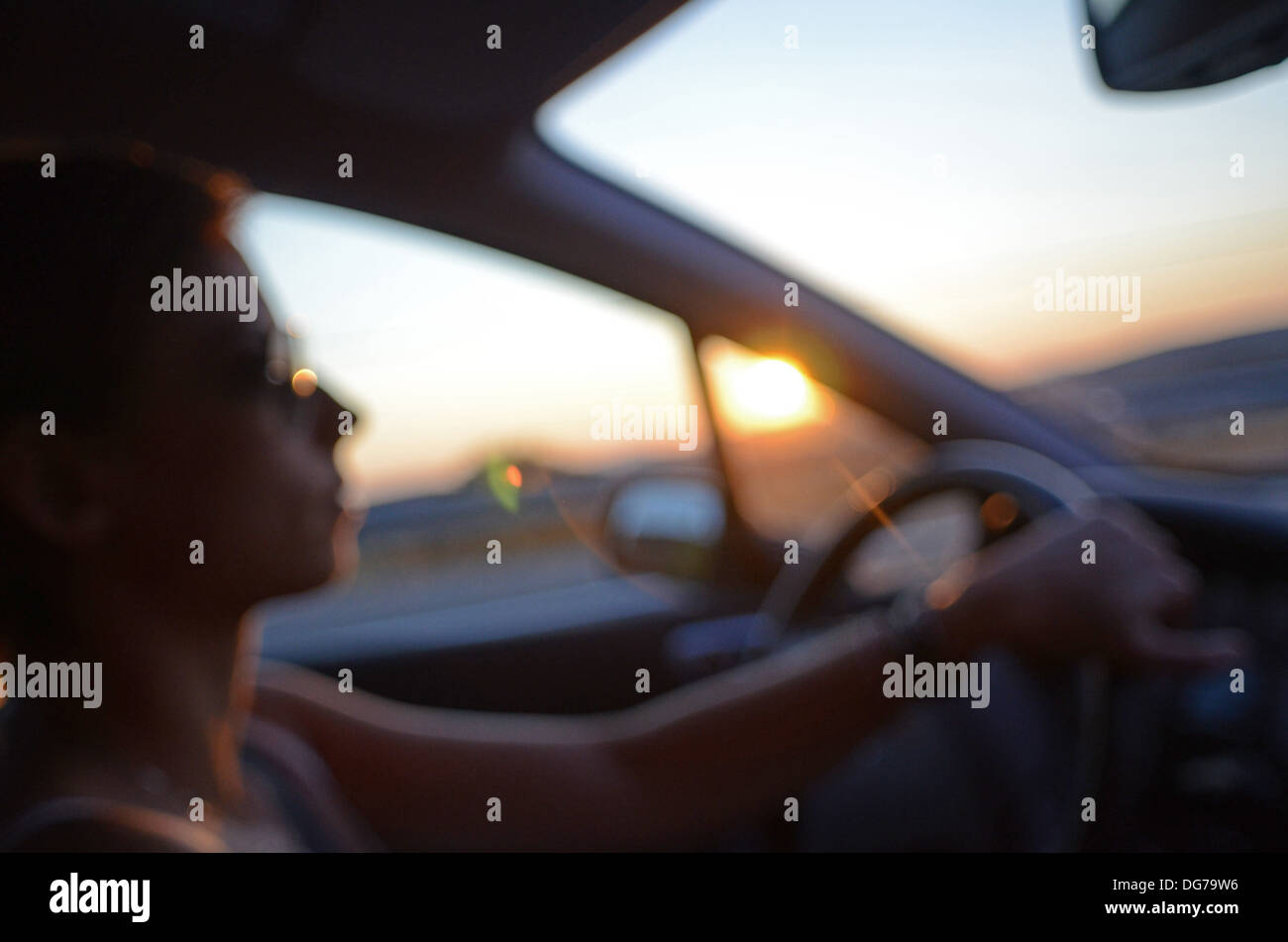 Driving into sunset hi-res stock photography and images - Alamy