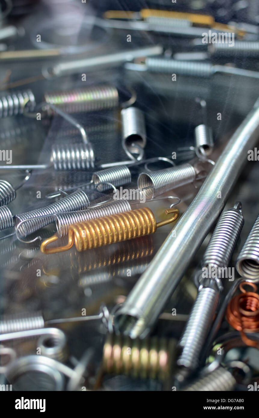 Metal replacement parts in store window Stock Photo - Alamy