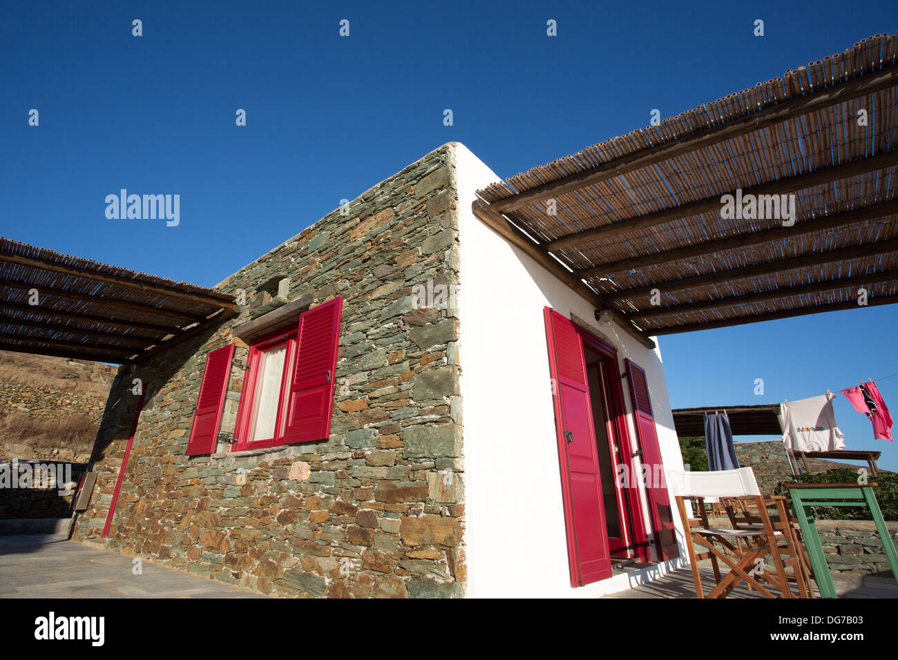 Typical Greek terrace at Folegandros, and a view of a hotel room and ...