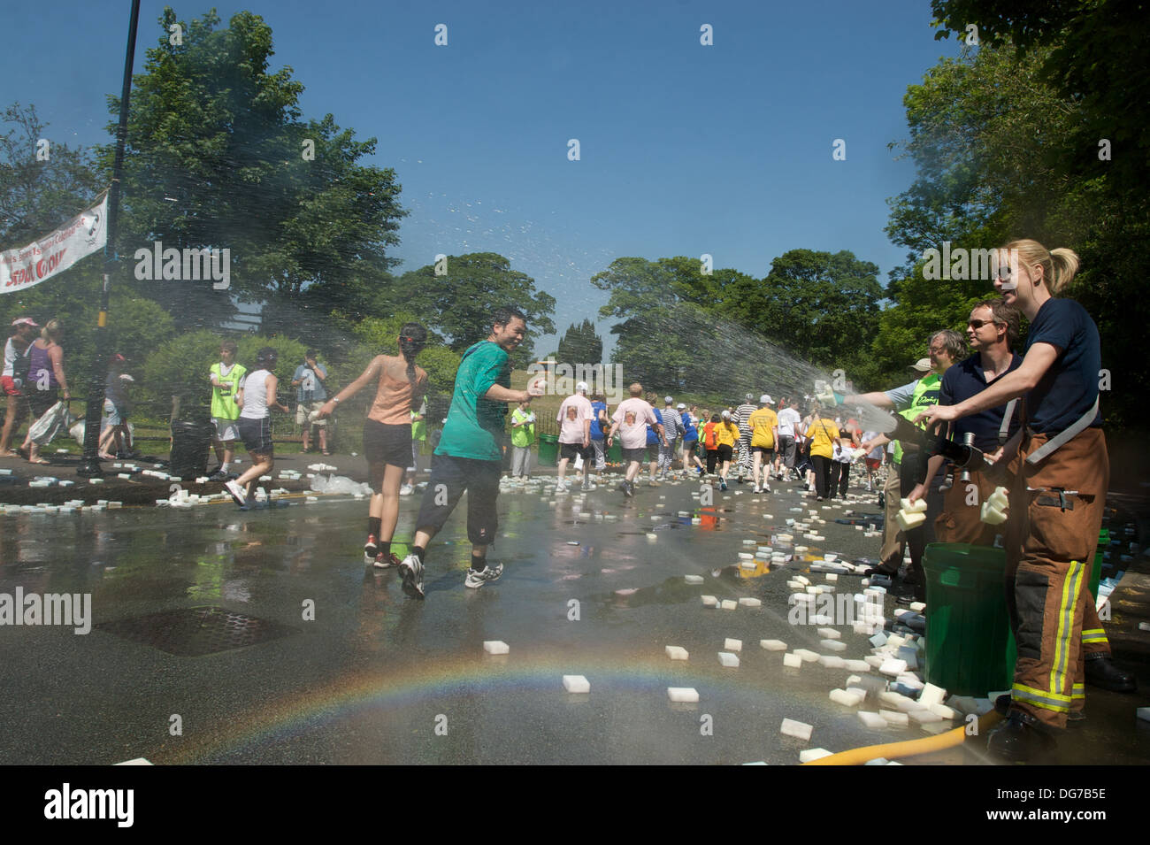 Runners pass through the water station during The Great Midlands Fun ...