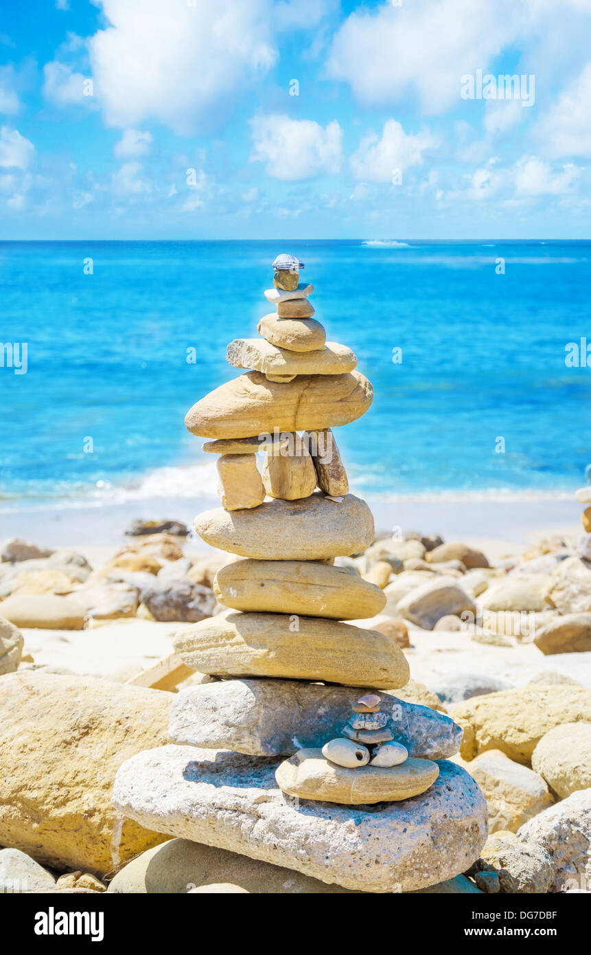 Stack of sea rocks balancing by Pacific ocean Stock Photo - Alamy
