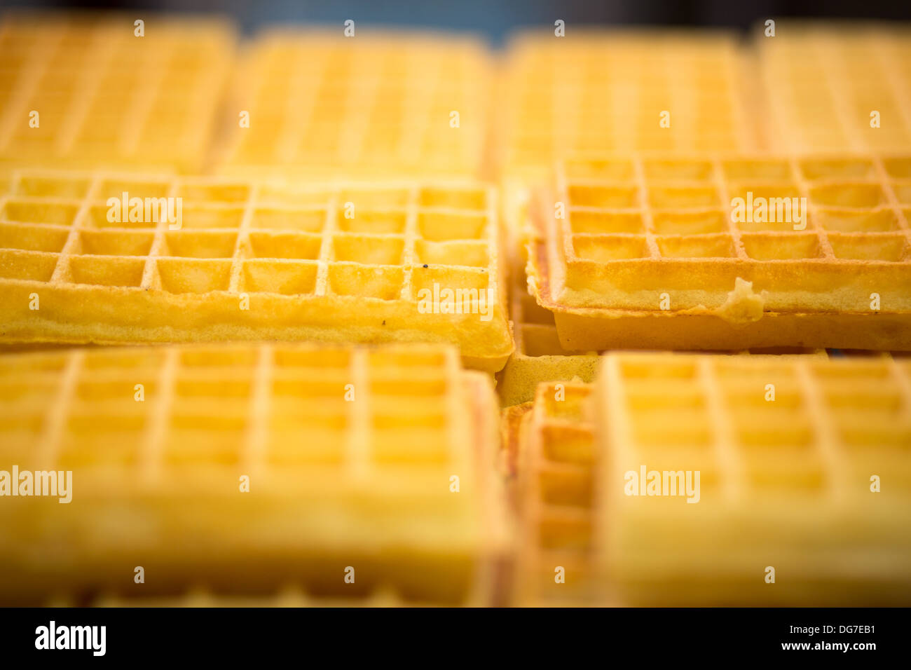 Close up of a yellow waffles with selective focus. The Waffle is a ...